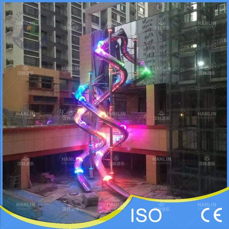Outdoor LED Illuminated Stainless Steel Spiral Slide | Nighttime ...